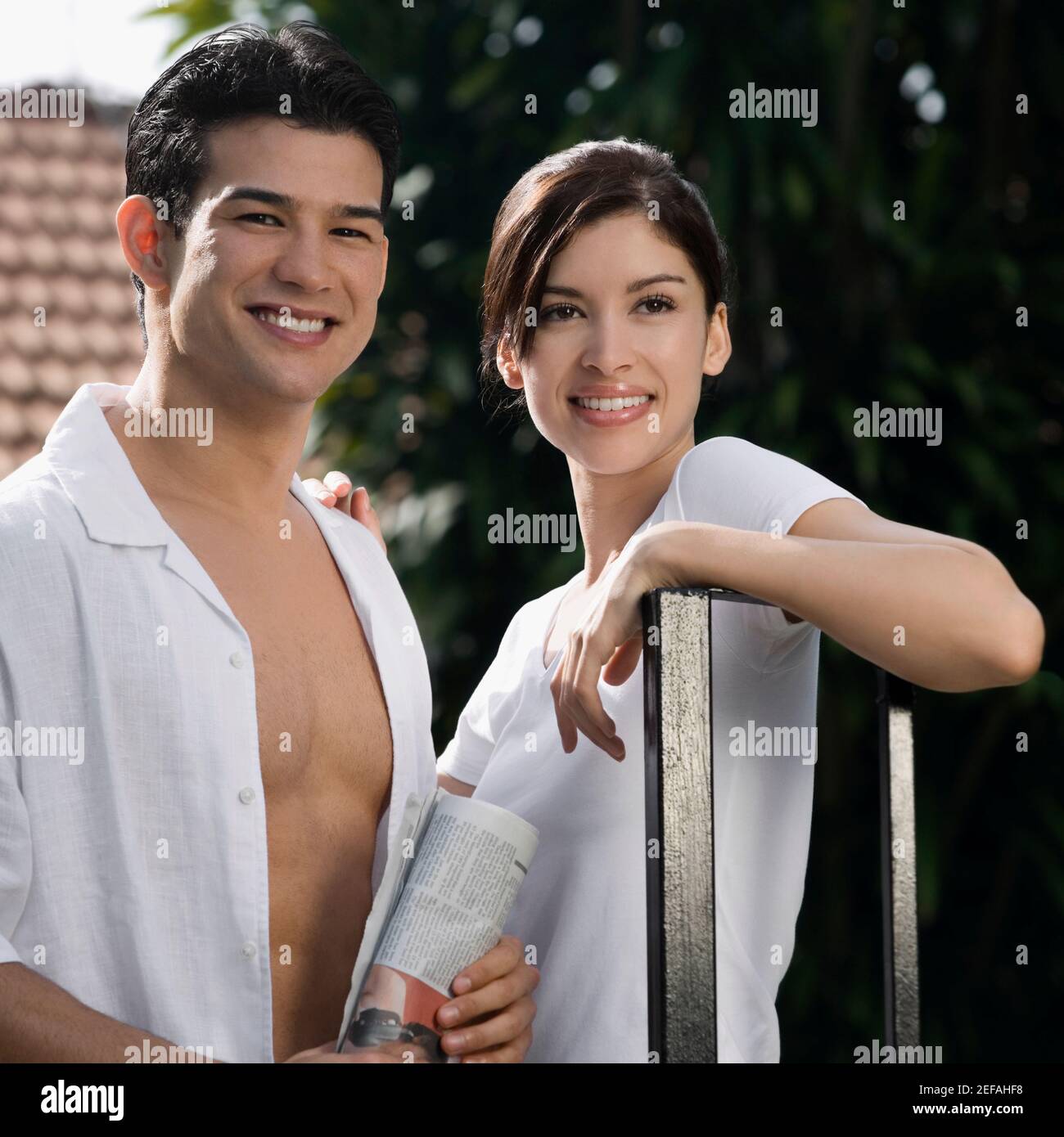Standing communication looking away smiling the media hi-res stock ...
