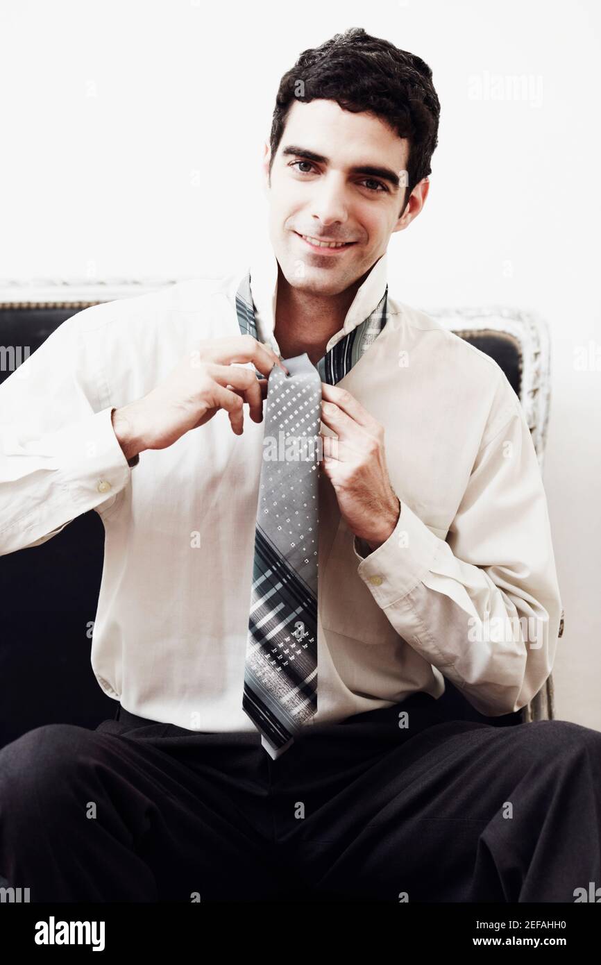 Close up businessman tying hi-res stock photography and images - Alamy