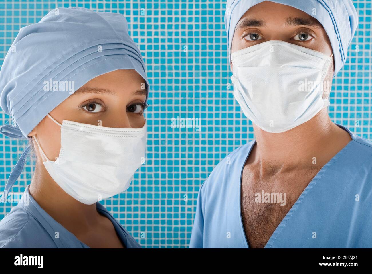 Close up of a male surgeon and a female surgeon Stock Photo - Alamy
