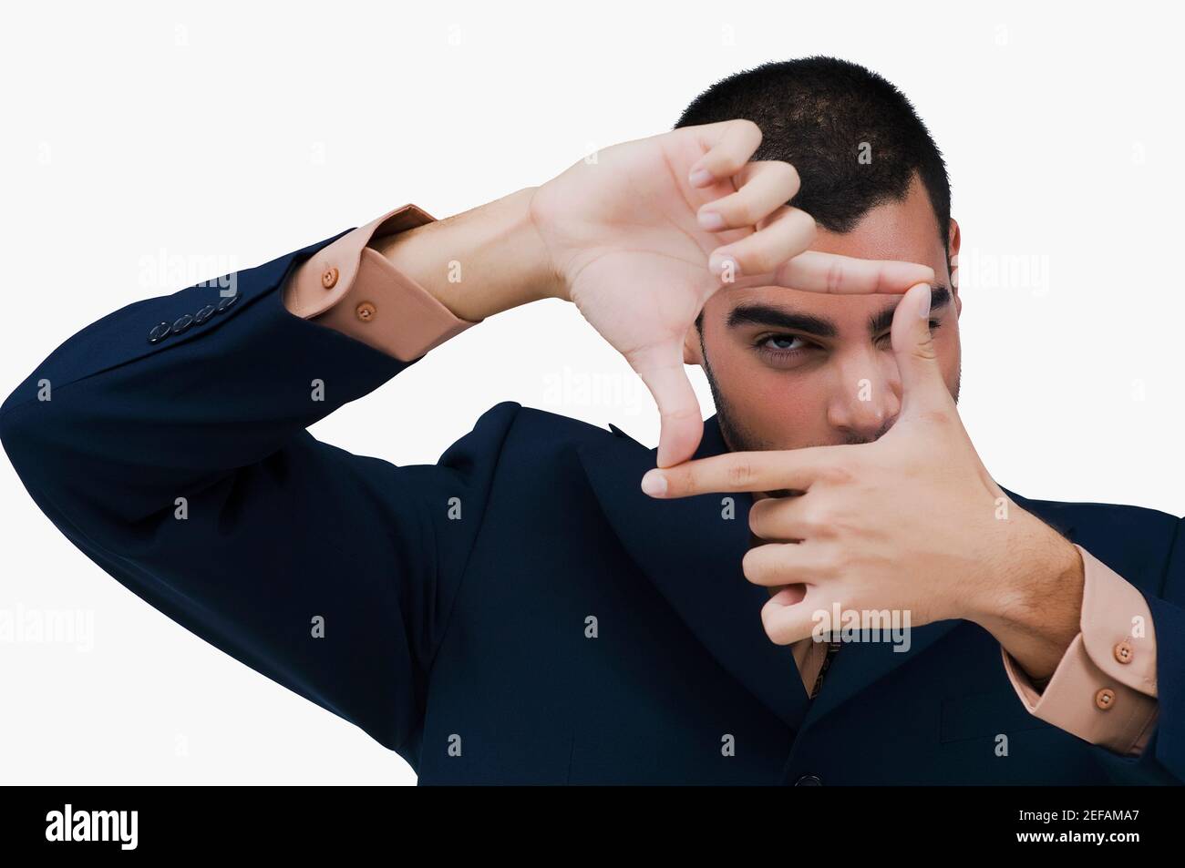 Portrait of a businessman making a finger frame Stock Photo - Alamy