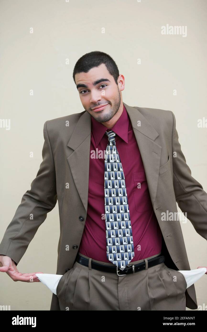 Young man pulling out empty pockets hi-res stock photography and images ...