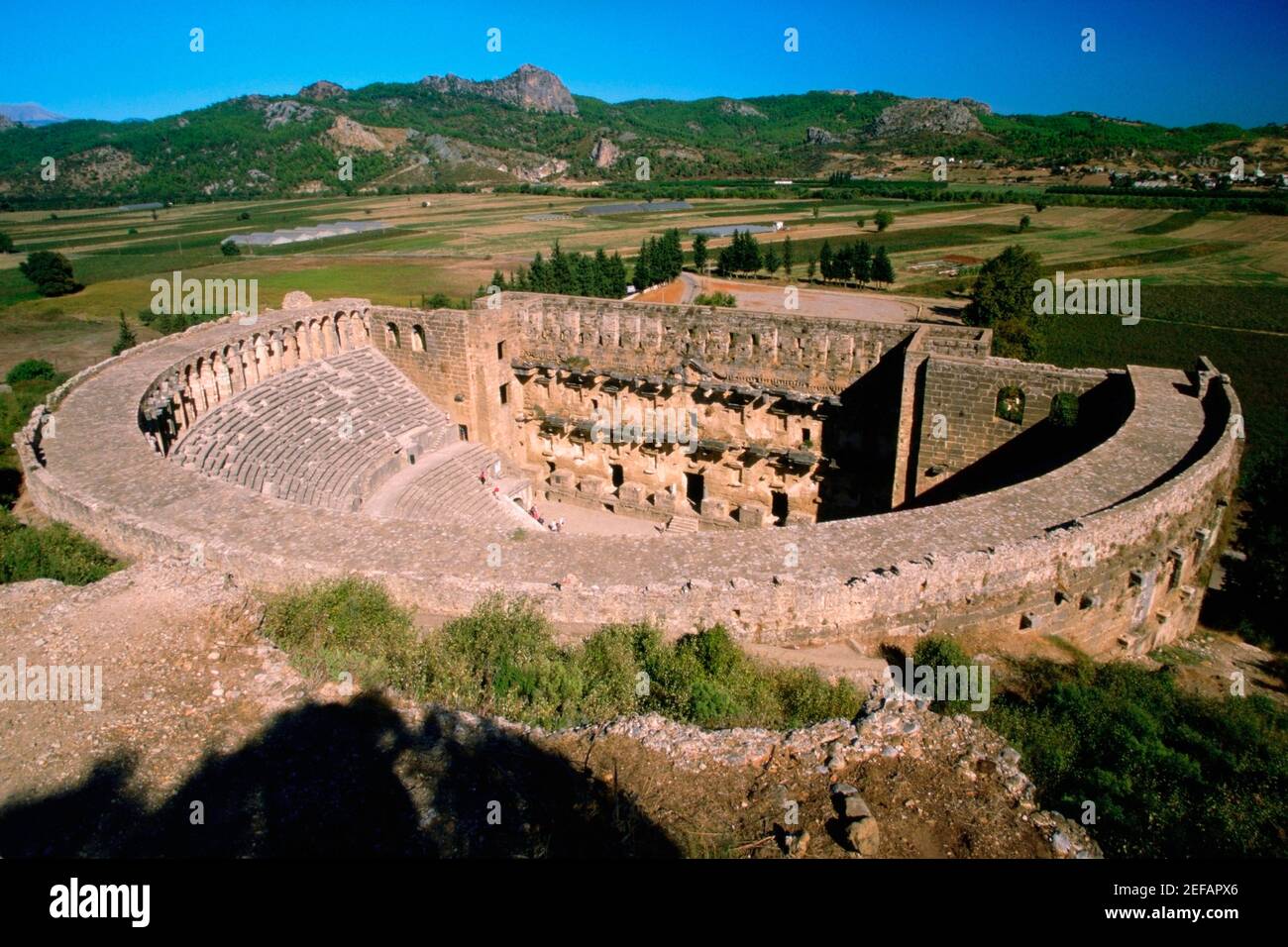 High angle view of an old ruins of an amphitheater, Aspendos, Turkey ...