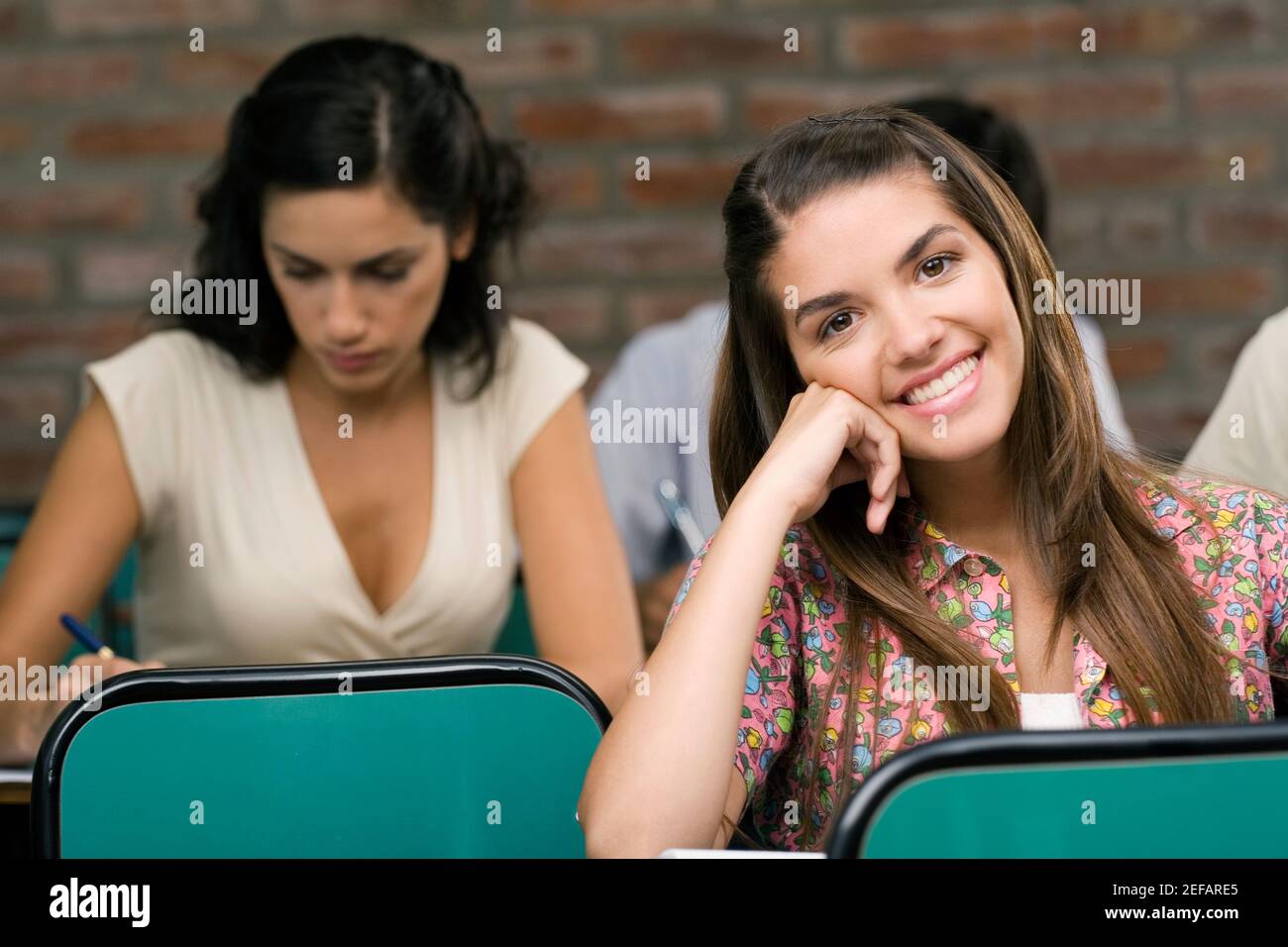 University students sitting in a classroom Stock Photo - Alamy
