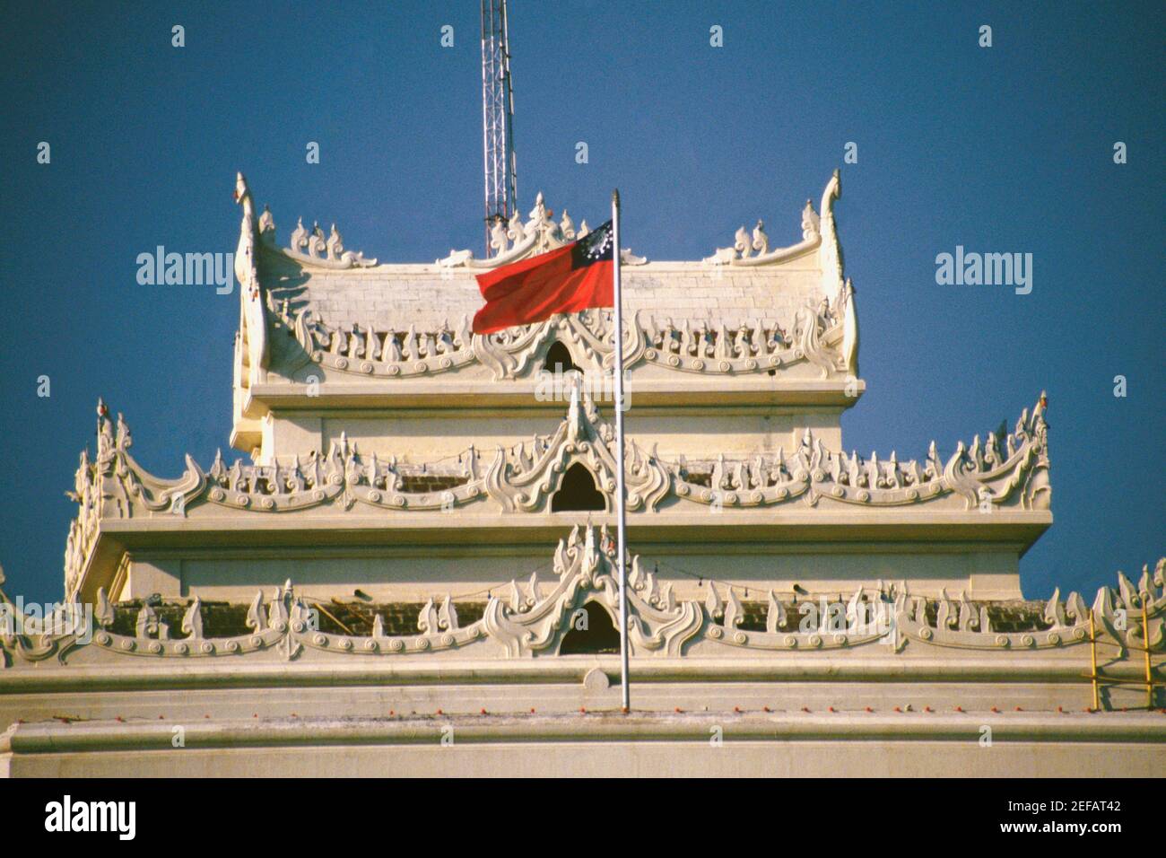 National flag fluttering on a city hall, Yangon, Myanmar Stock Photo ...