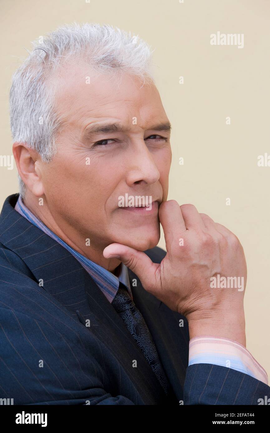 Serious businessman brainstorming colleagues hi-res stock photography ...