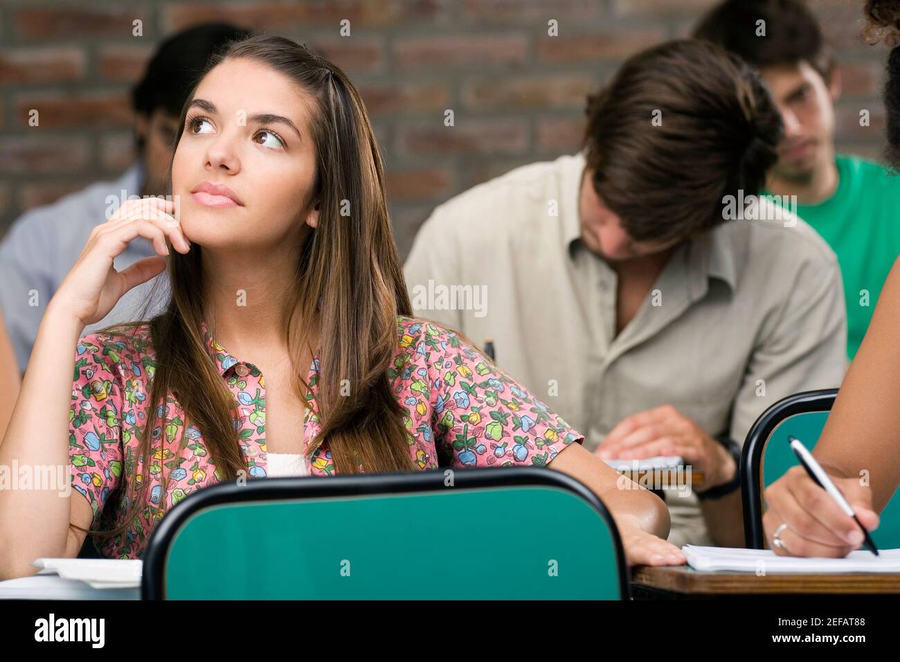 University students sitting in a classroom Stock Photo - Alamy