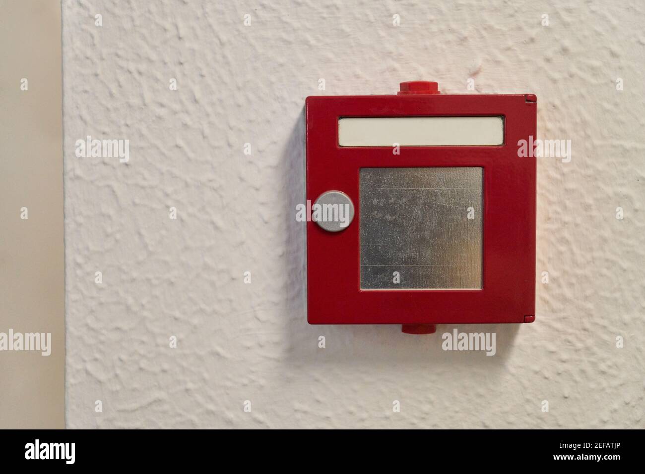 Emergency fire alarm as fire safety in the hallway of a house Stock ...