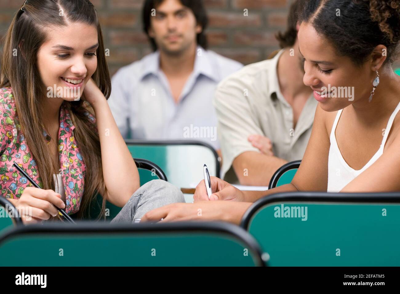 University students studying in a classroom Stock Photo - Alamy