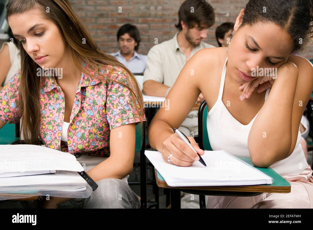 University students studying in a classroom Stock Photo - Alamy