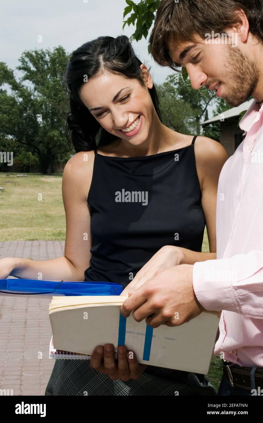 Two university students discussing Stock Photo - Alamy