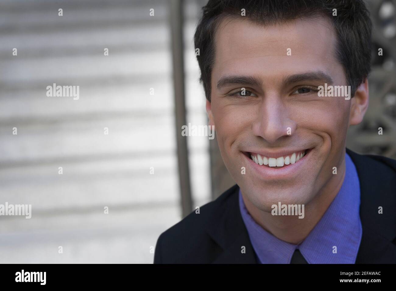 Portrait of a businessman smiling Stock Photo - Alamy