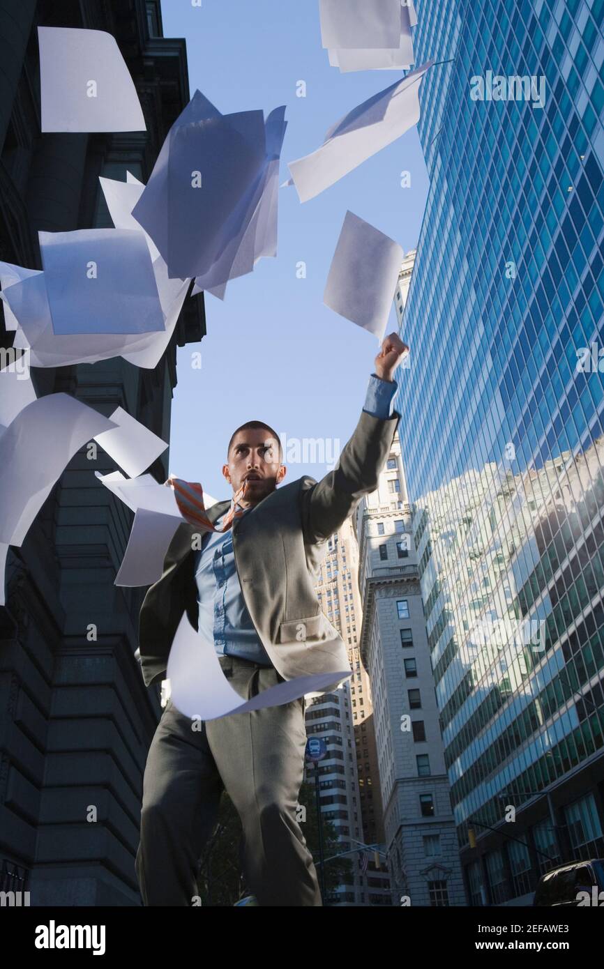 Throwing papers in the air hi-res stock photography and images - Alamy