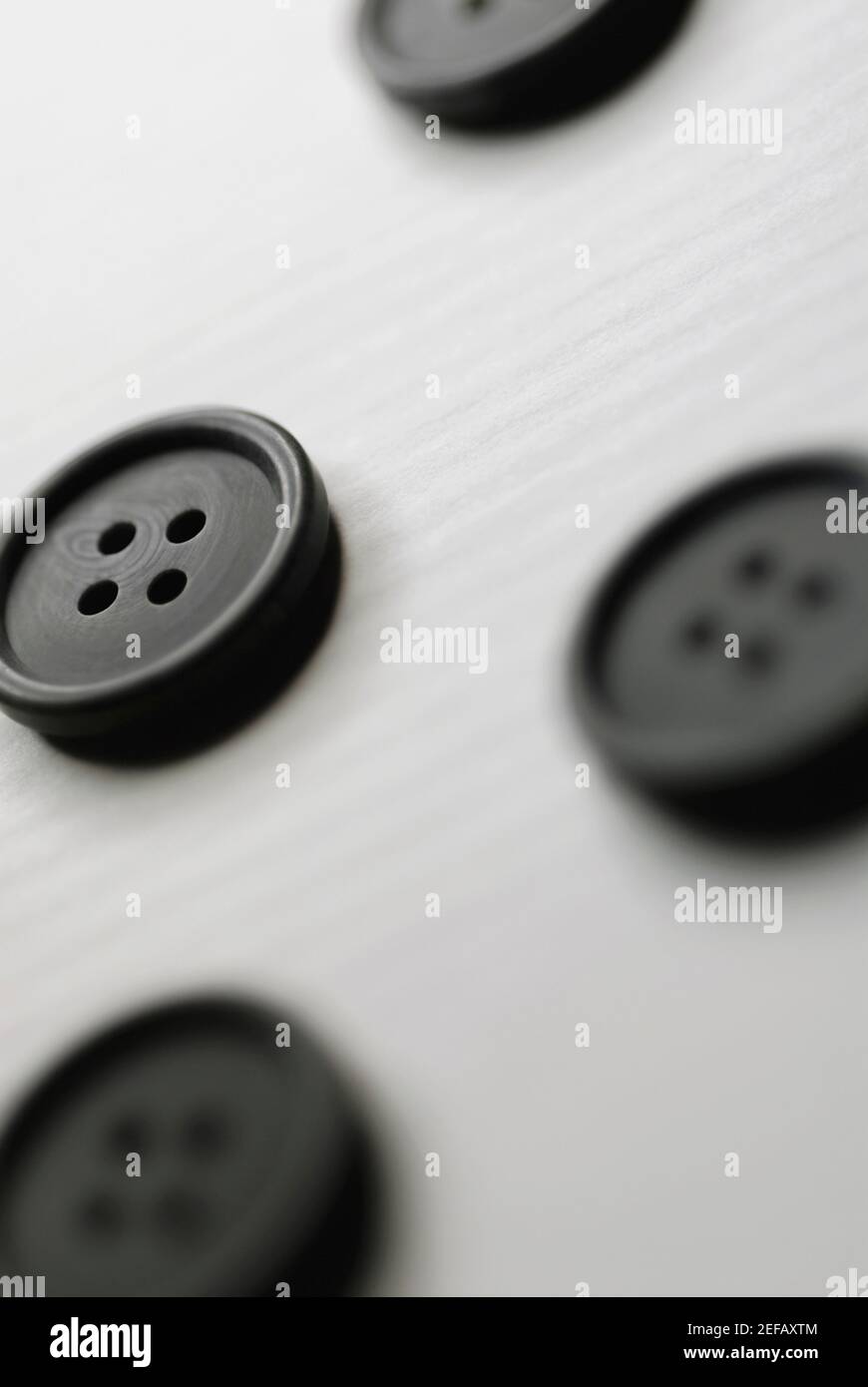 Close up of four buttons Stock Photo - Alamy