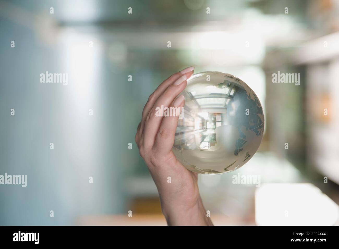 Human hand holding transparent ball hi-res stock photography and images ...