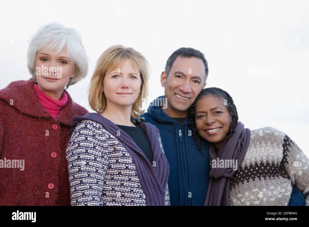 Portrait of four friends smiling Stock Photo - Alamy