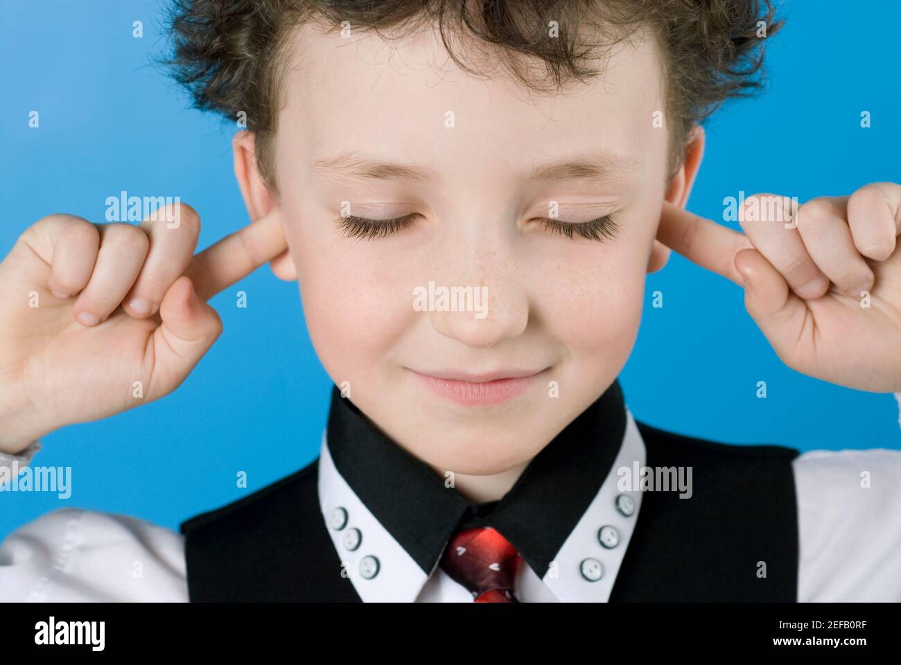 Children people fingers in ears hi-res stock photography and images - Alamy