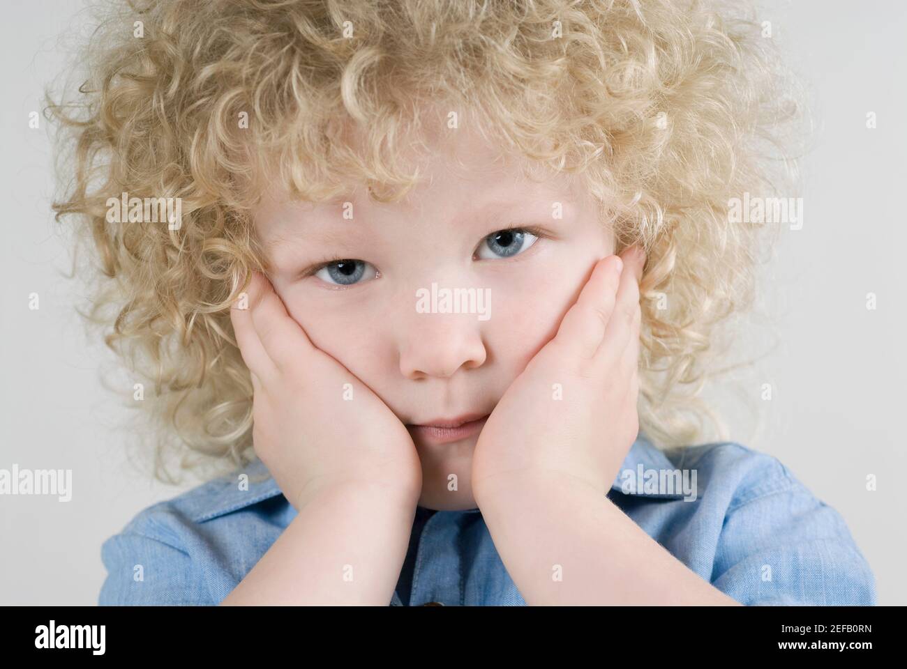 Portrait of a boy thinking Stock Photo - Alamy