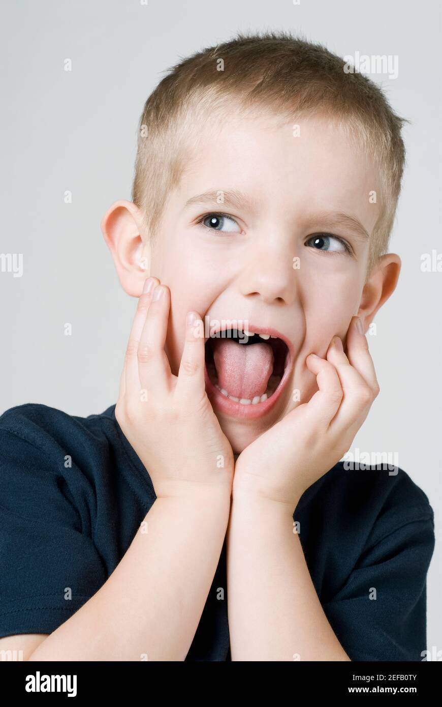 Close up of a boy shouting Stock Photo - Alamy
