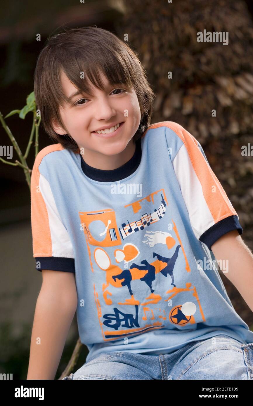 Portrait of a schoolboy smiling Stock Photo - Alamy