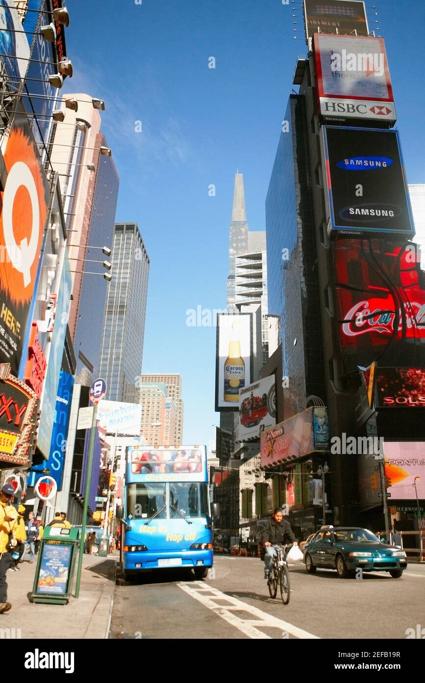 Bus on a road, Times Square, Manhattan, New York City, New York State ...