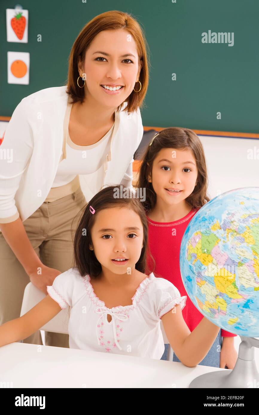 Teacher student looking map hi-res stock photography and images - Alamy