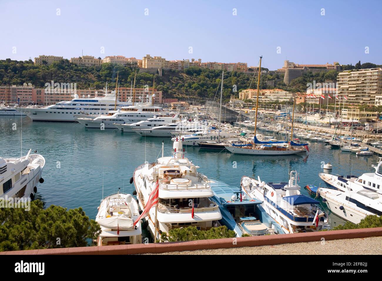 Ferries and boats docked at a harbor, Port of Fontvieille, Monte Carlo ...