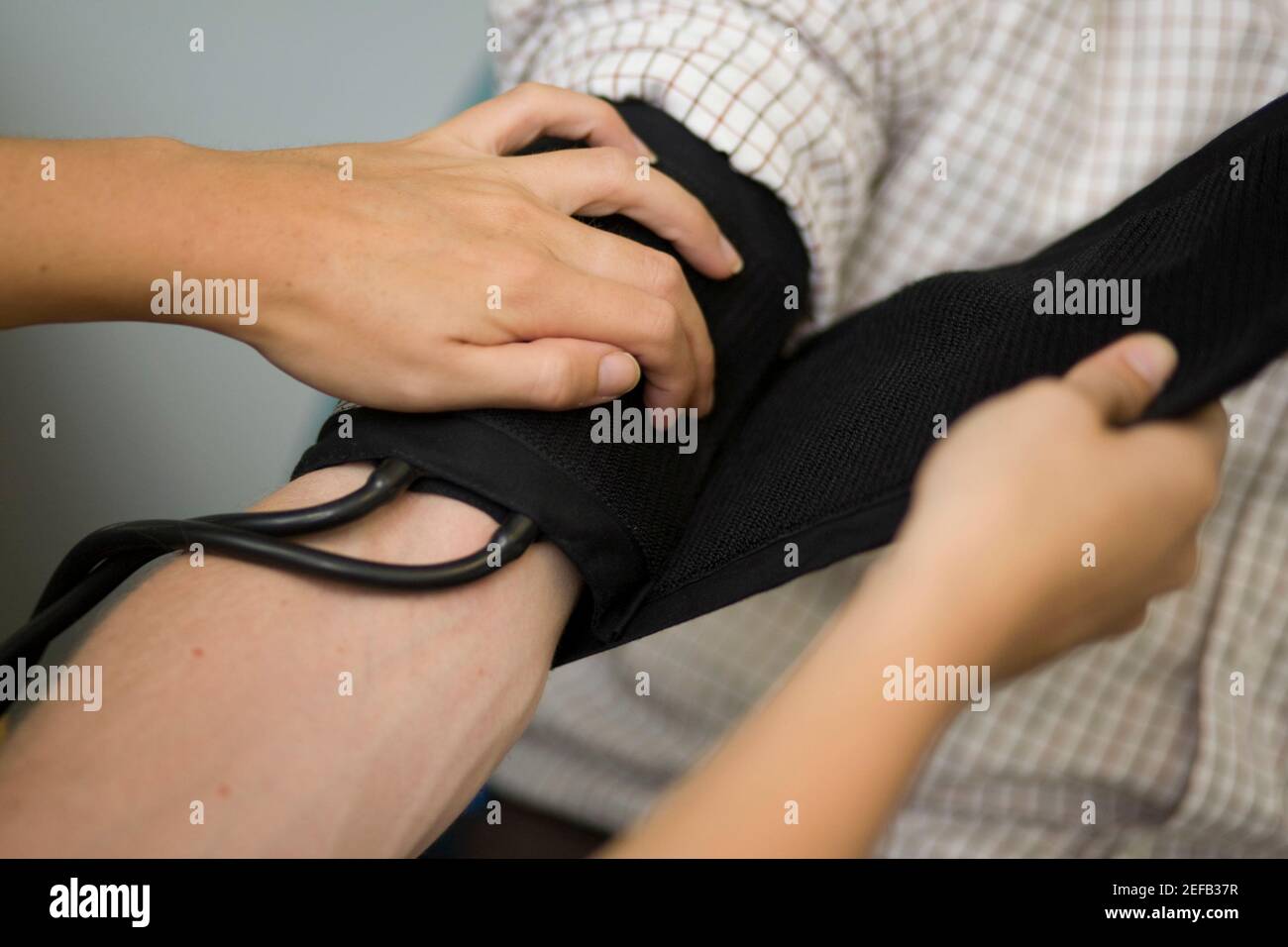 medical-students-learn-to-take-blood-pressure-measurements-stock-photo