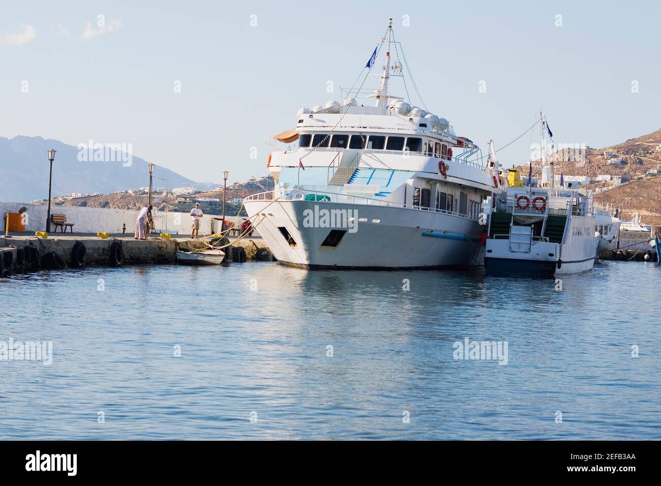 Cruise ship docked at a harbor, Mykonos, Cyclades Islands, Greece Stock ...