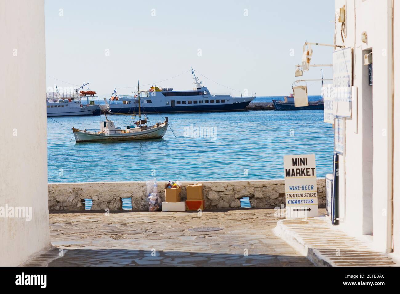 Cruise ships at a harbor, Mykonos, Cyclades Islands, Greece Stock Photo ...