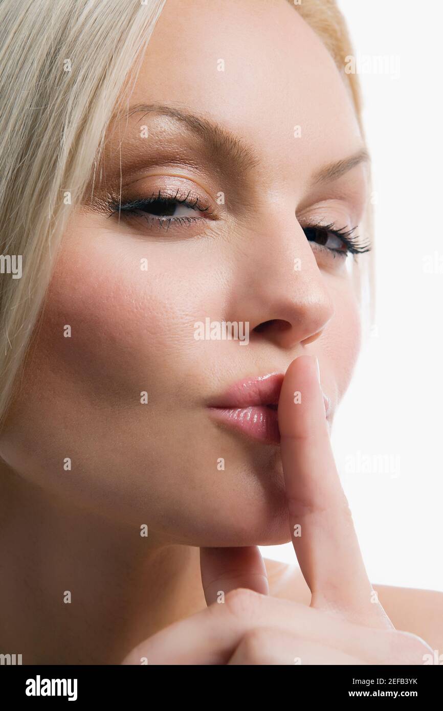 Finger on lip adult hi-res stock photography and images - Alamy