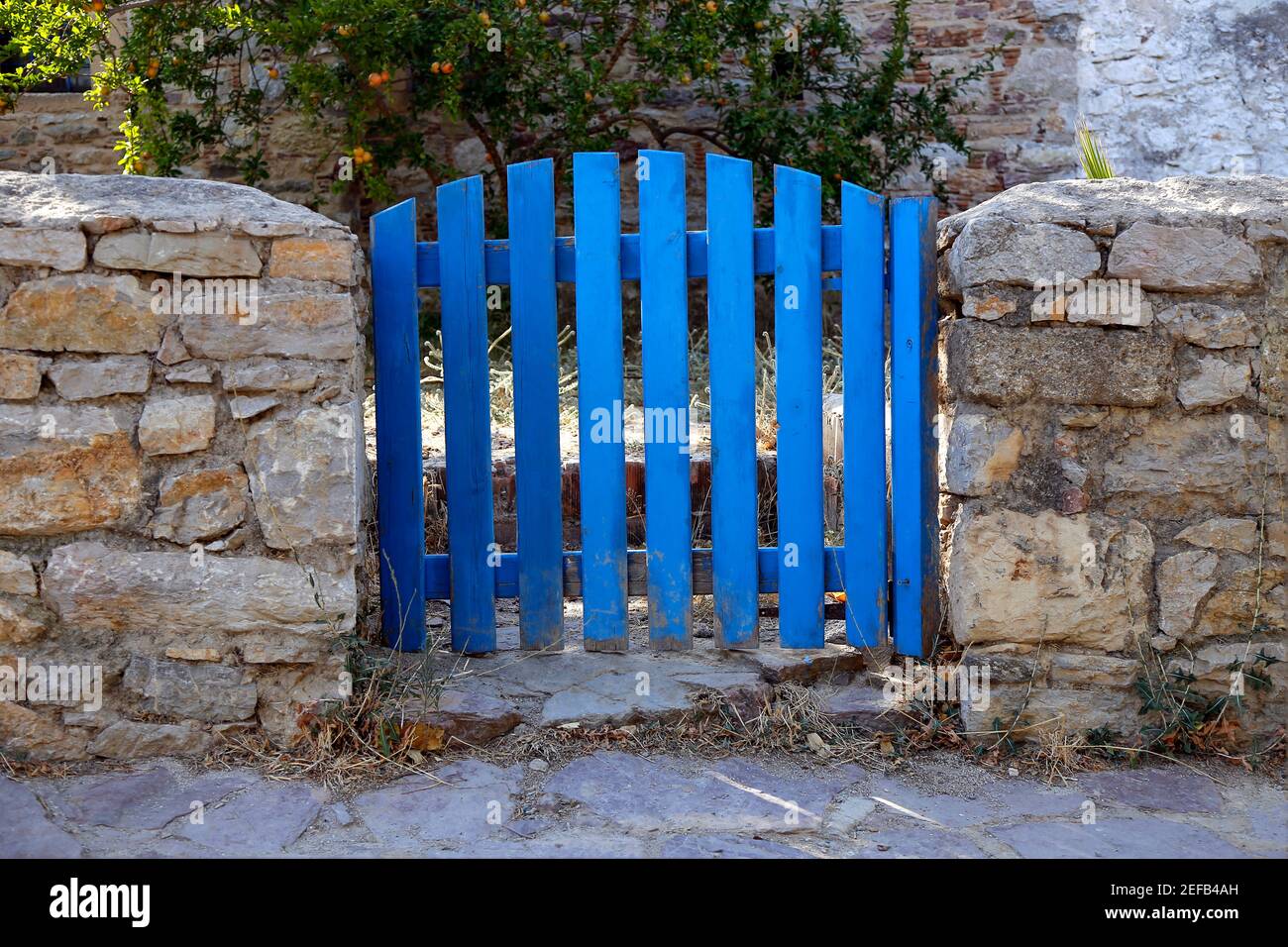 The blue door with serenity view in Turkey Stock Photo - Alamy