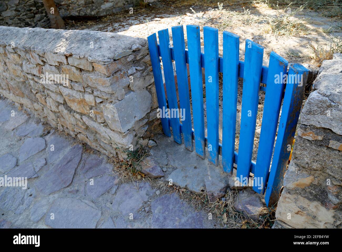 The blue door with serenity view in Turkey Stock Photo - Alamy