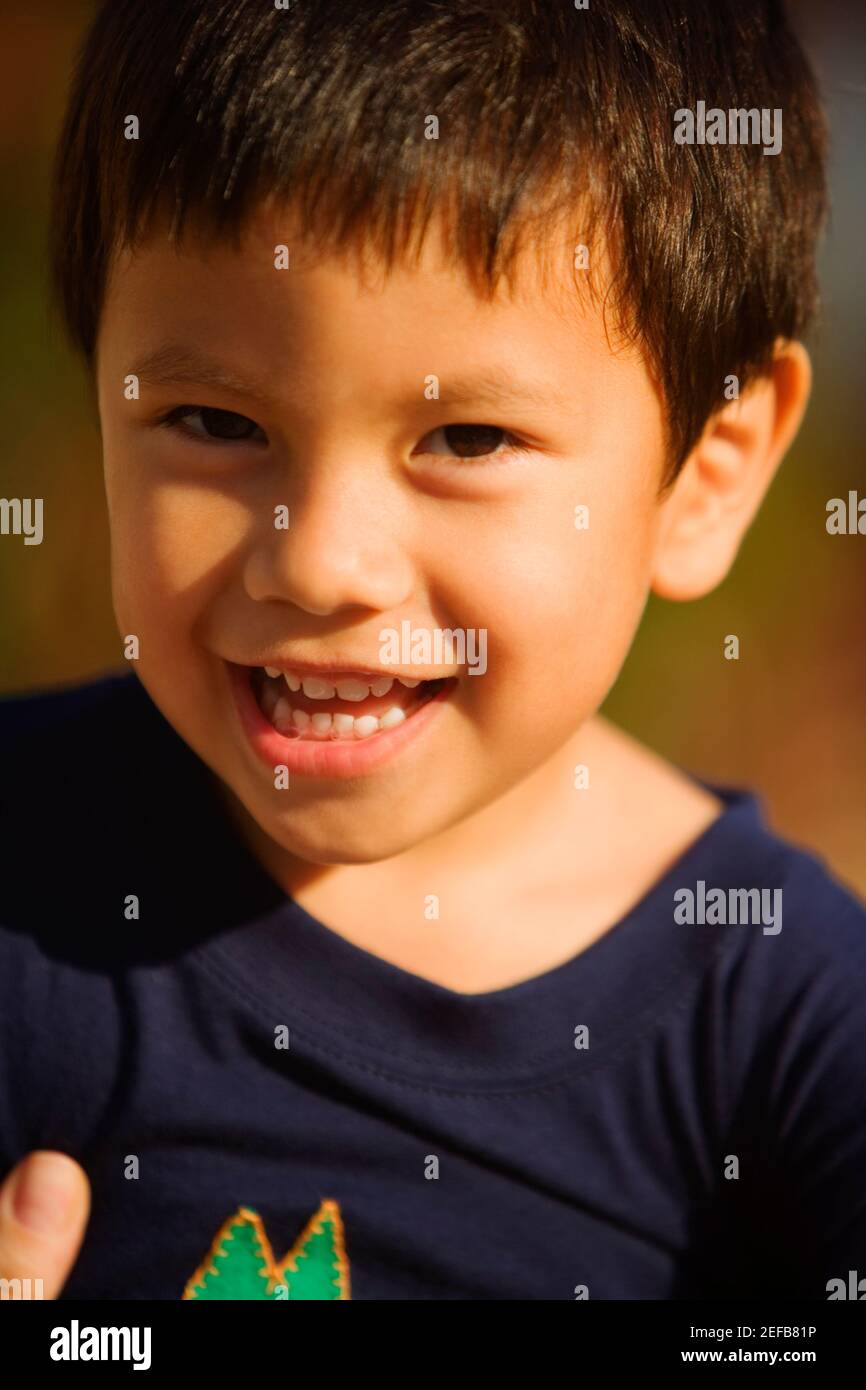 Portrait of a boy smiling Stock Photo - Alamy