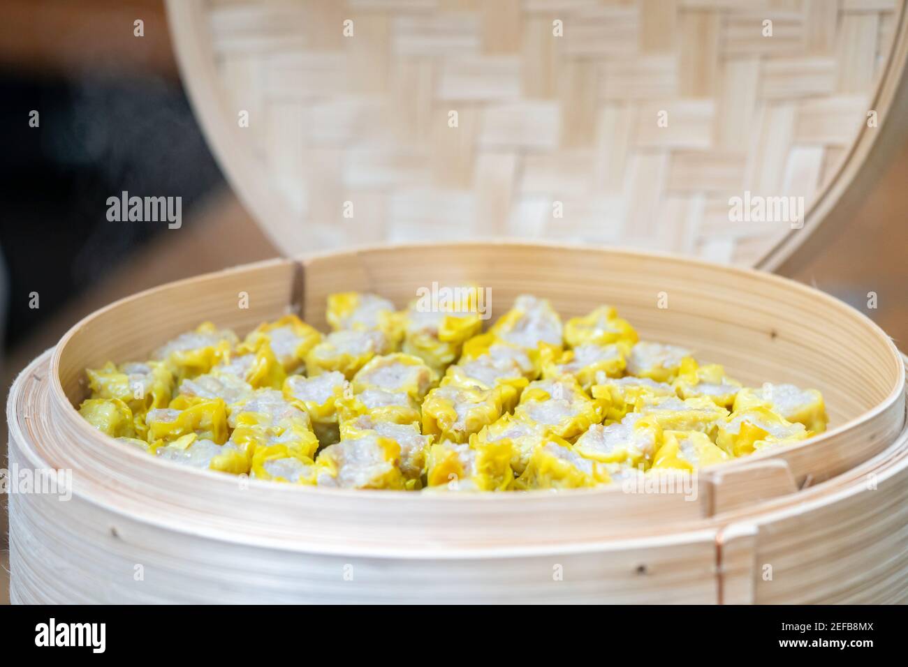 Dim Sim (Kanom jeeb) the chinese steamed dumpling on banana leaf in ...