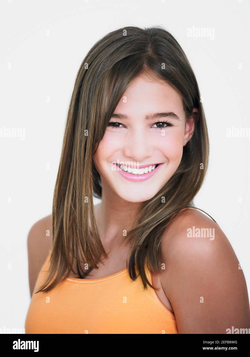 Portrait of a teenage girl smiling Stock Photo - Alamy