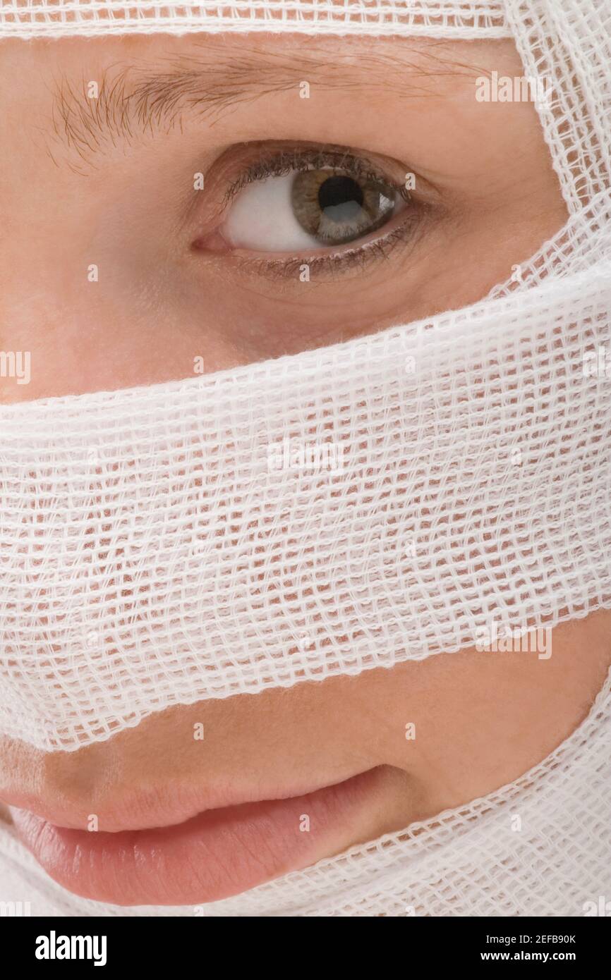 Wrapped face woman bandage hi-res stock photography and images - Alamy