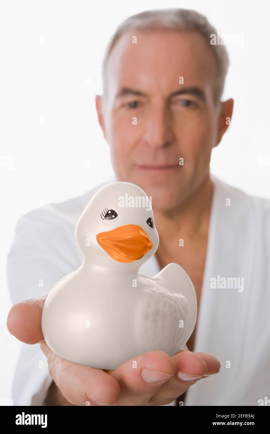 Hand holding rubber duck hi-res stock photography and images - Alamy