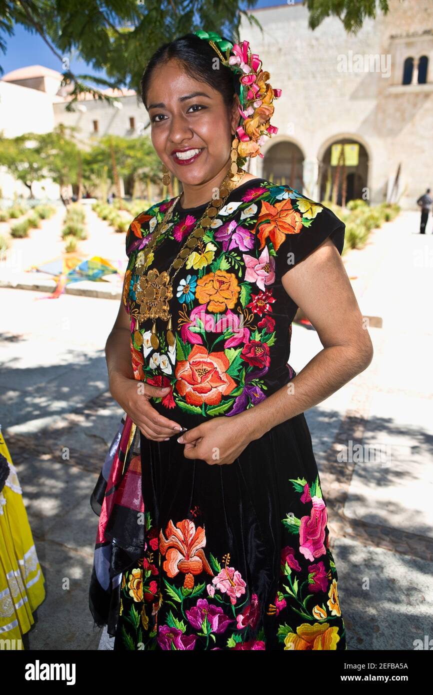 Portrait of a mid adult woman in traditional clothing, Oaxaca, Oaxaca ...