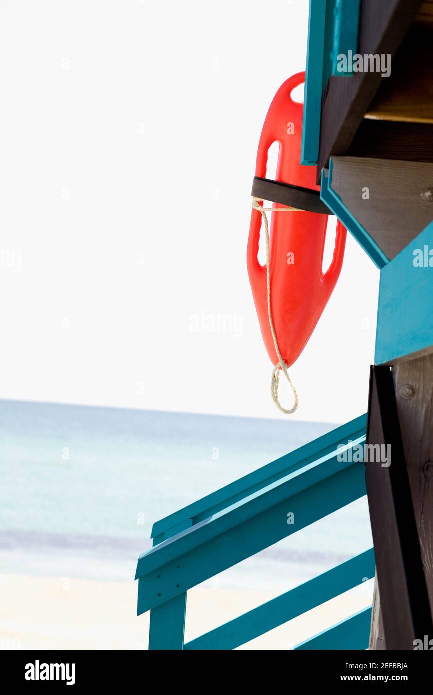 Lifeguard float hanging on a lifeguard hut Stock Photo - Alamy
