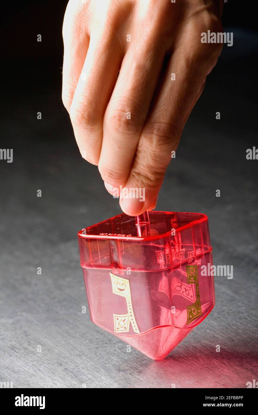 Hand spinning top hi-res stock photography and images - Alamy