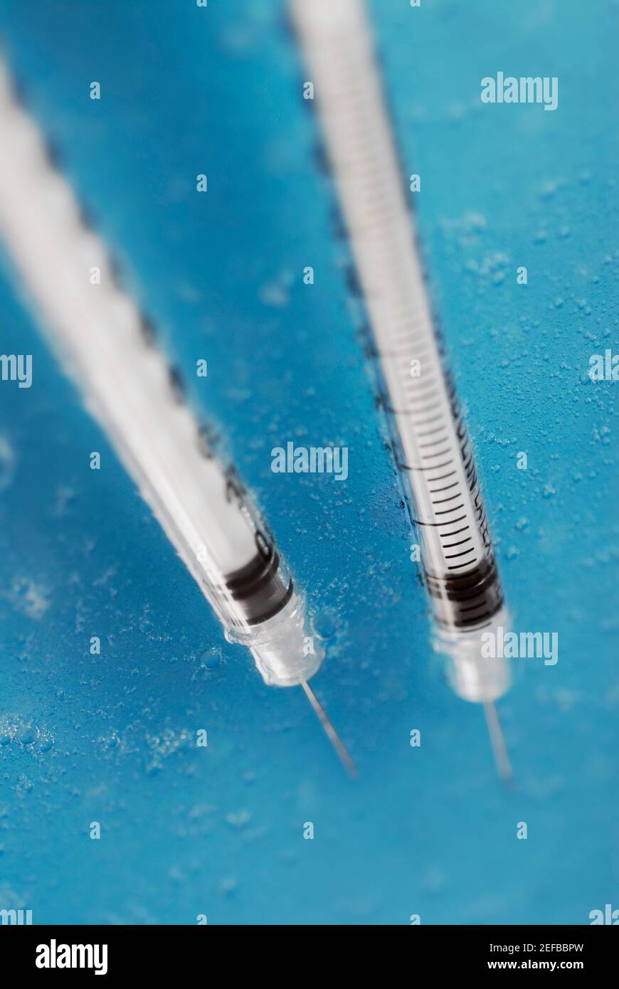Close up of two syringes Stock Photo - Alamy