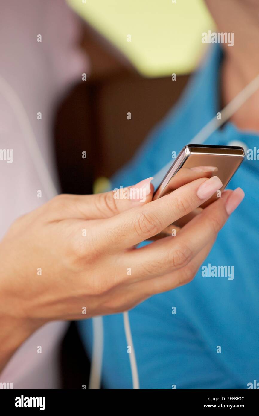 Hand holding ipod hi-res stock photography and images - Alamy