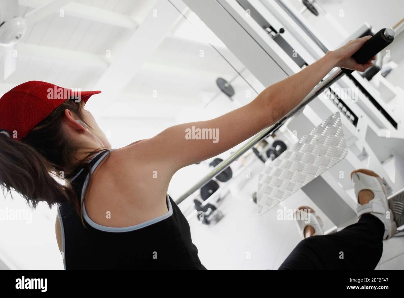Close up of a woman exercising in a gym Stock Photo - Alamy