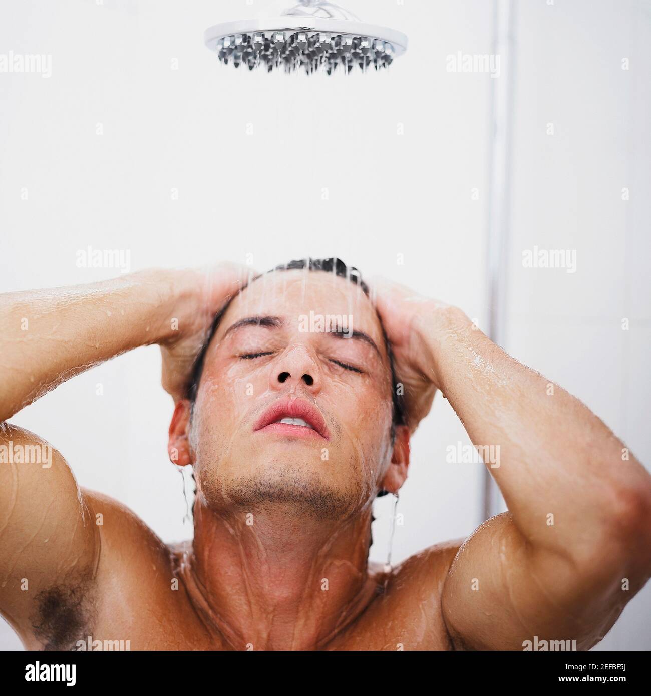 Man having a shower hi-res stock photography and images - Alamy
