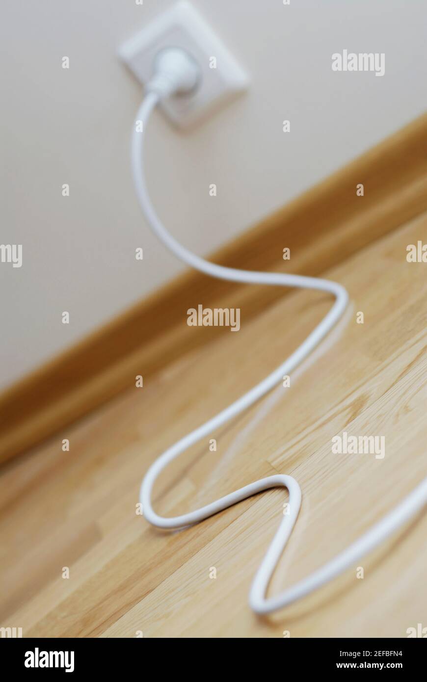 Plug in an electrical outlet Stock Photo - Alamy