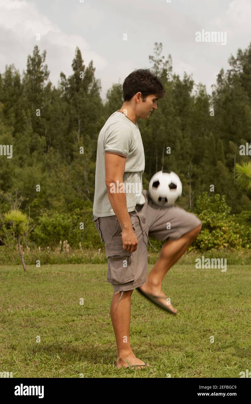 Man playing football 35 years hi-res stock photography and images - Alamy