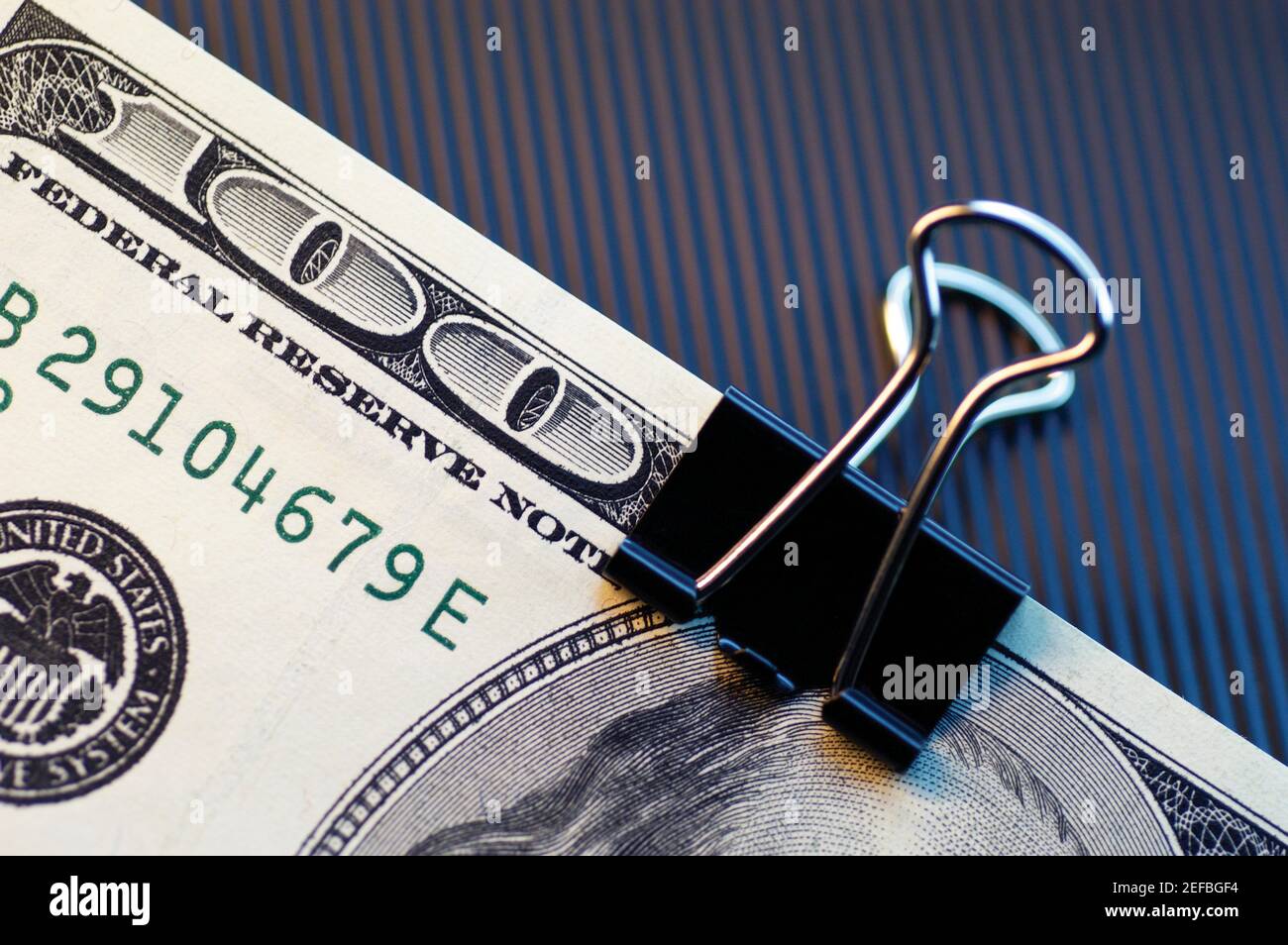 Clip on top of United States one hundred dollar bill, close-up Stock ...