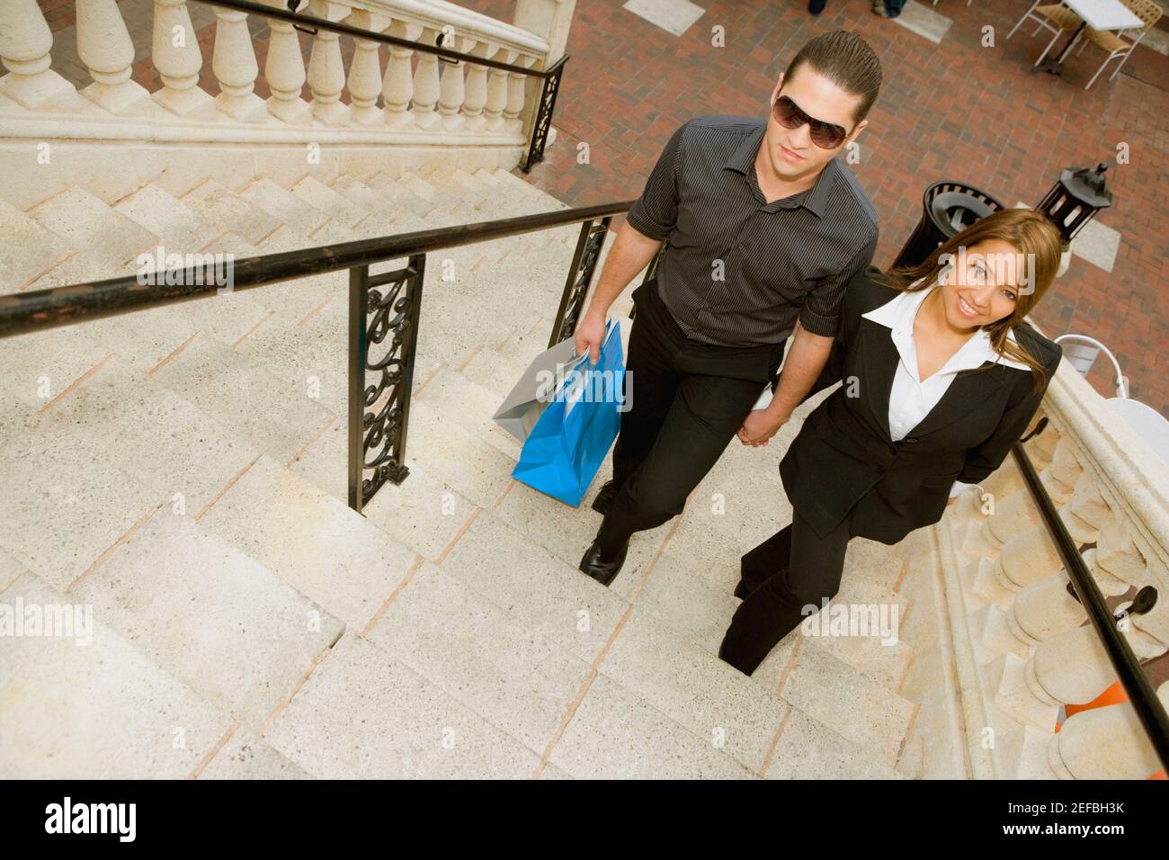 People moving up and down on steps hi-res stock photography and images ...