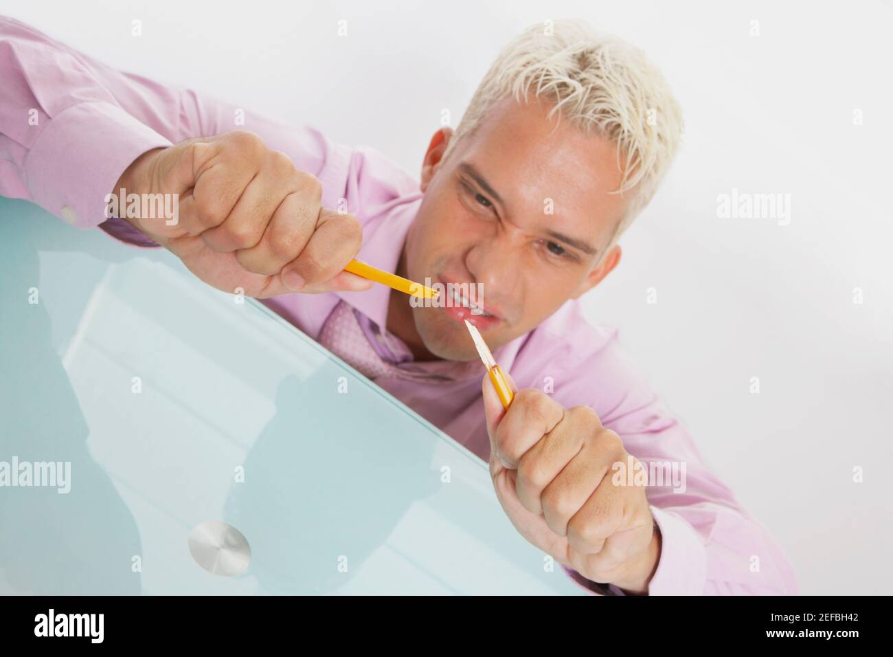 Breaking a pencil hi-res stock photography and images - Alamy