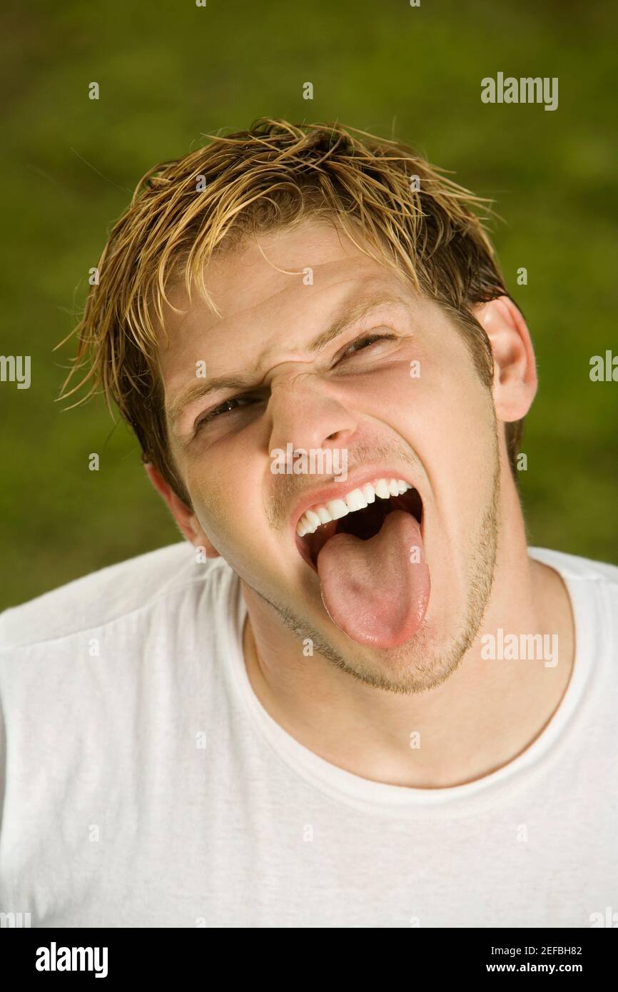 Mouth open tongue out man hi-res stock photography and images - Alamy